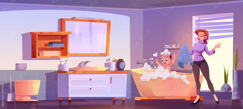 Little kid washing in bathtub with foam and mother standing with towel ...