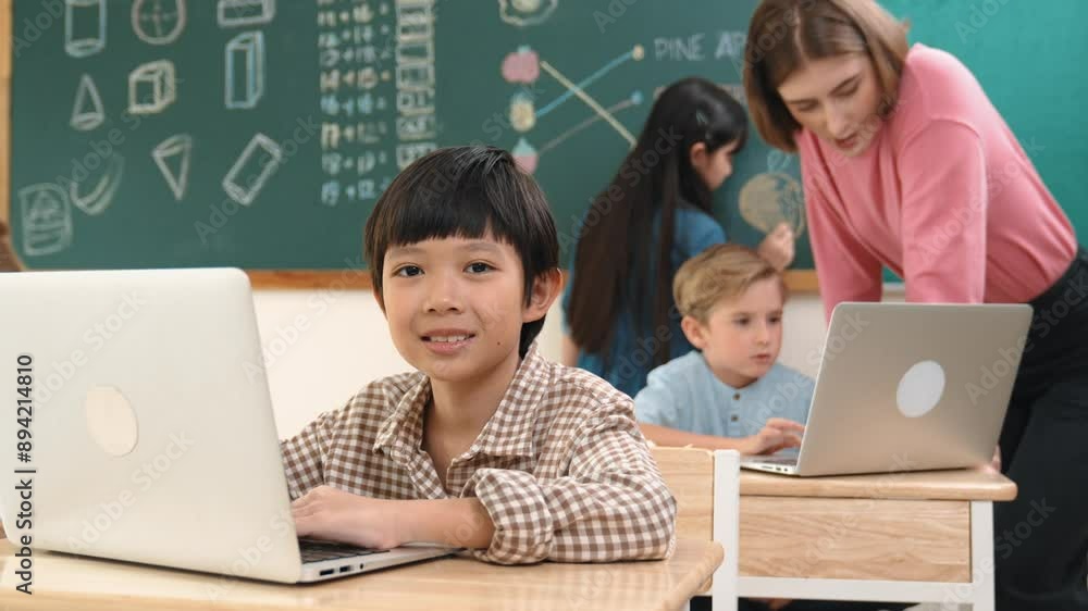 Cute boy coding engineering prompt while attractive girl drawing ...