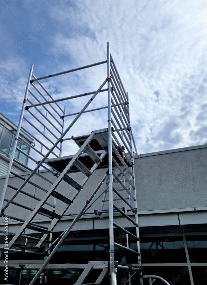 tinsmith repairs the front of the house, the tinner works with copper ...