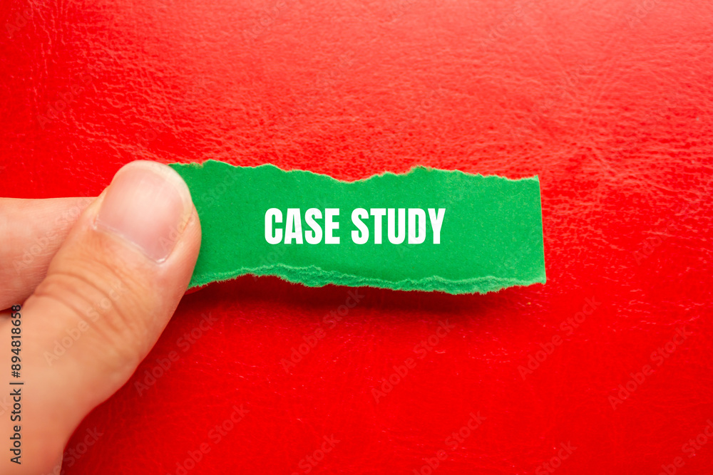 Case study message written on ripped torn green paper with red background. Conceptual case study ...