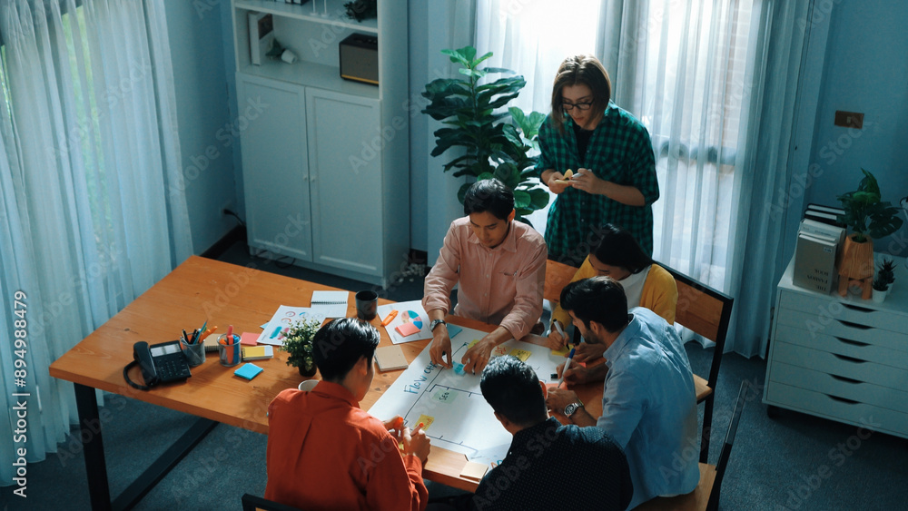 Close up of professional business team hands writing and putting sticky ...