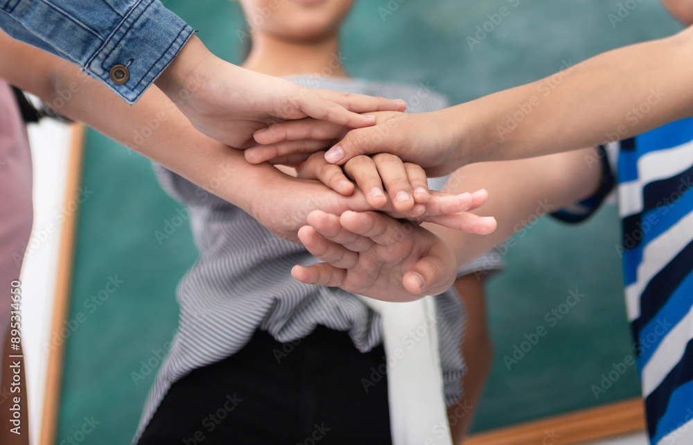 Foto de Close up hands, Unity in diversity: Young hands join together ...