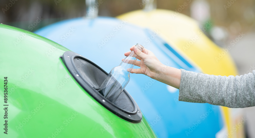 Waste Sorting And Recycling Concept. Unrecognizable female throwing ...