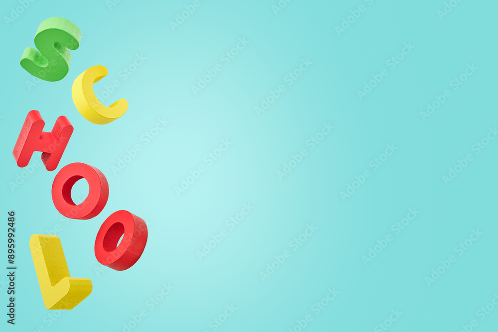 School word made from flying colorful letters on blue background. Back ...