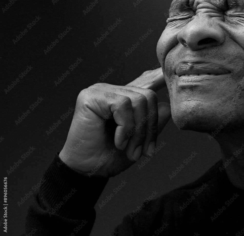 deaf man suffering from deafness and hearing loss on grey background ...