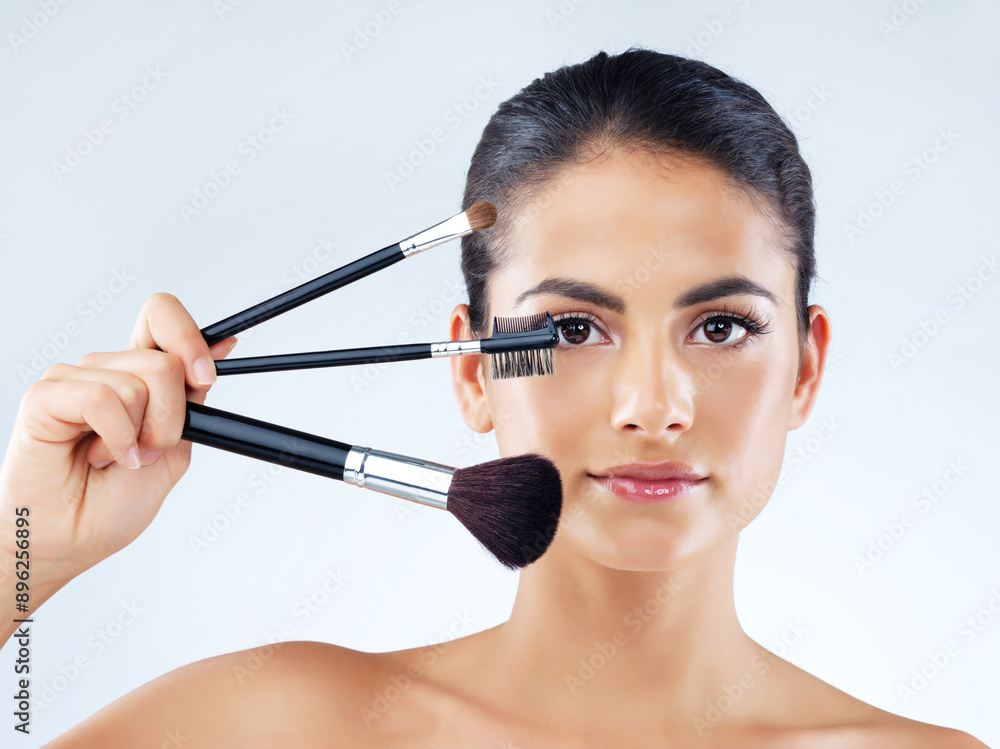 Portrait, makeup and woman with brush in studio for cosmetic ...