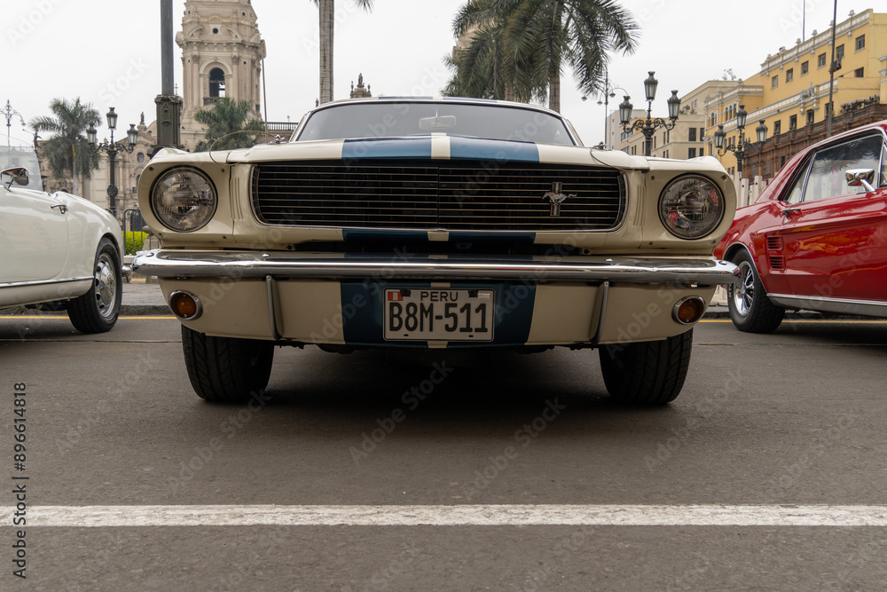 old collector cars on display in the Plaza de Armas of Lima, July 7 ...