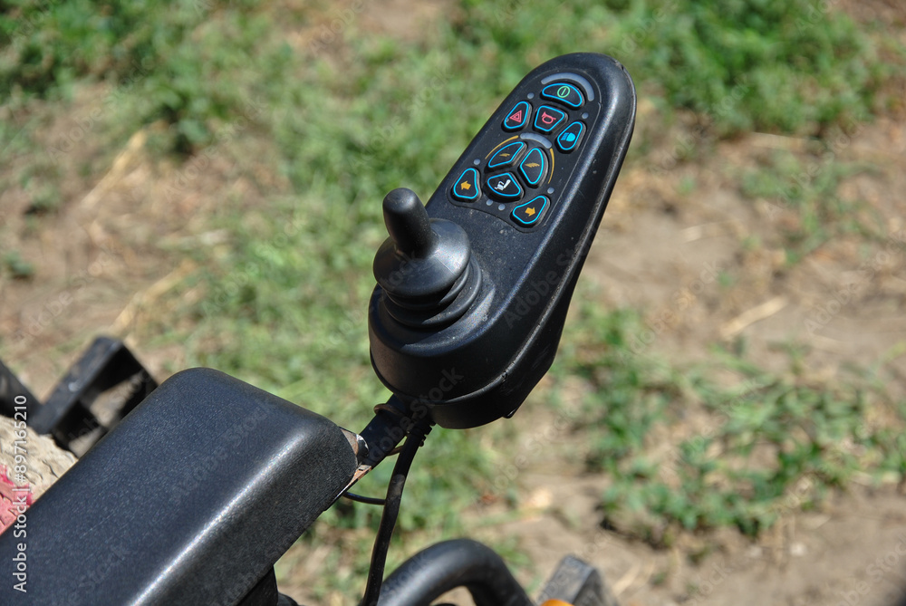 hand control panel for electric wheelchair. joystick and buttons for ...