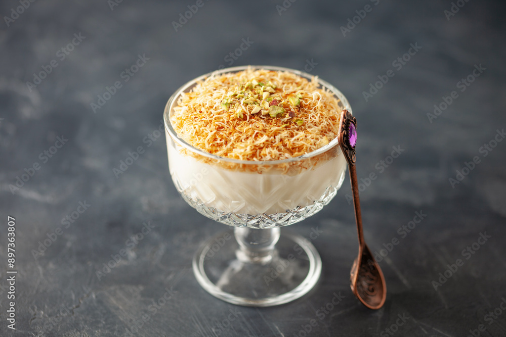 Traditional milky crispy Ramadan dessert custard pudding with roasted ...