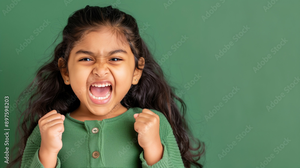 Angry Child with Emotional Expression. A little girl showing ...