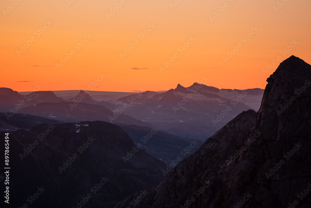 Midnight sun in arctic summer landscape of Norway. Silhouettes of ...
