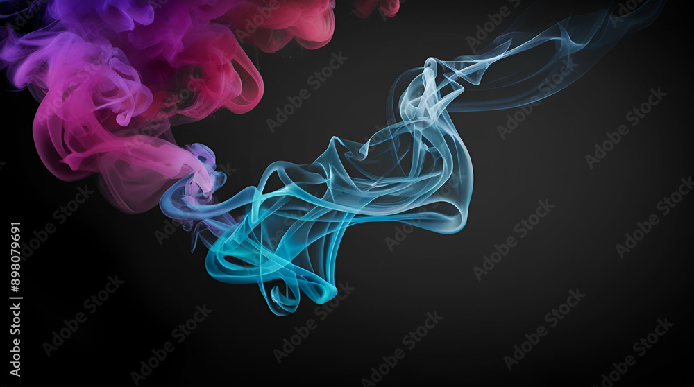Abstract Black background with wispy smoke illuminated by vibrant ...