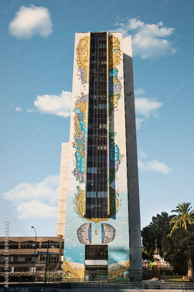 Beautiful mural on modern city tower in Valparaiso, Chile, portraying a ...