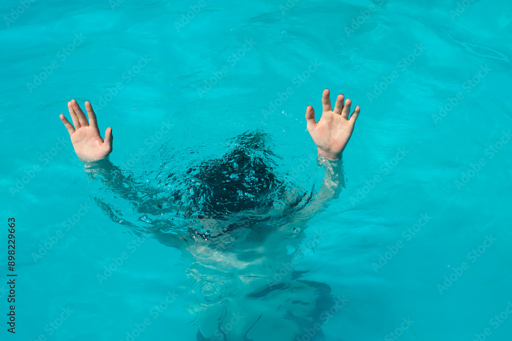 Drowning man's hands sticking out of water. Man drowning, gesture of ...