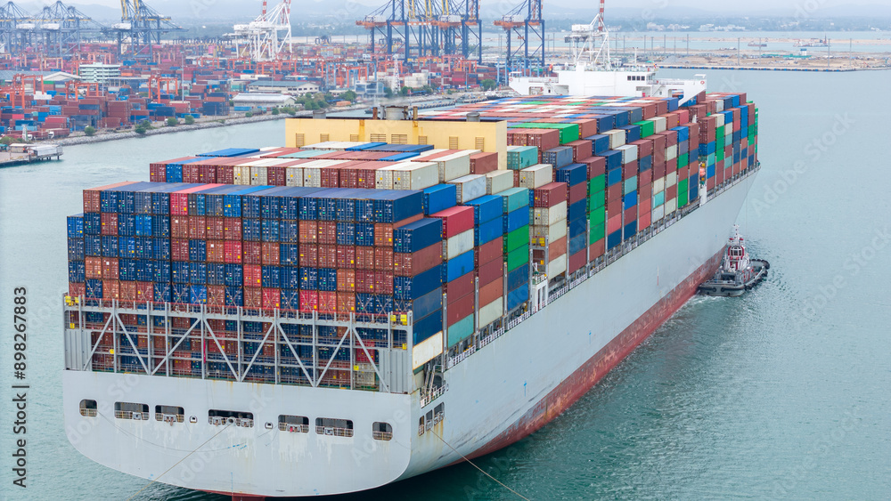 stern of Cargo container ship carrying container and running in ...