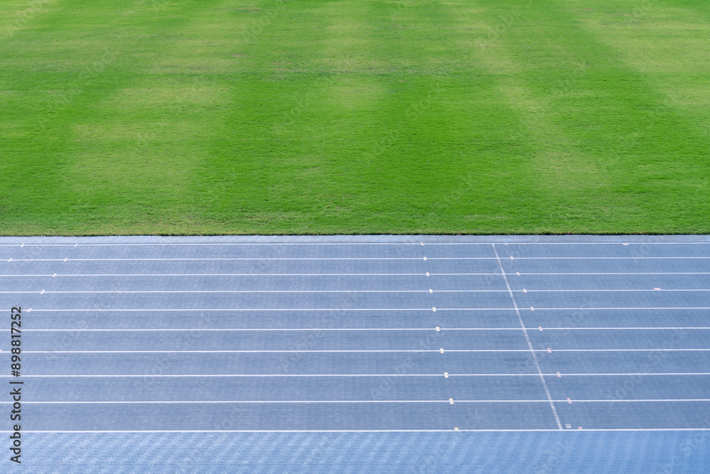 Blue track and field lanes. Running lanes at a track and field athletic ...