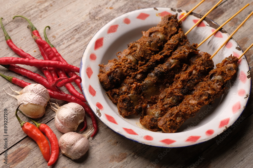 Clam Satay. Sate Kerang. Made from clams, chili, garlic, salt, spices ...