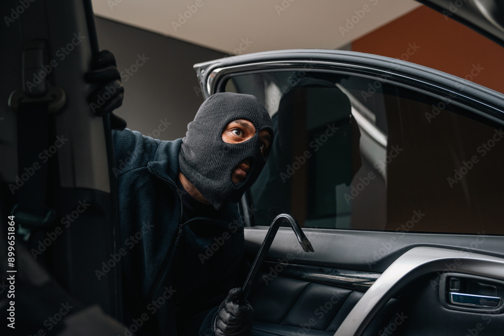 Thief in uniform black jacket various action stolen cars. The Robber ...