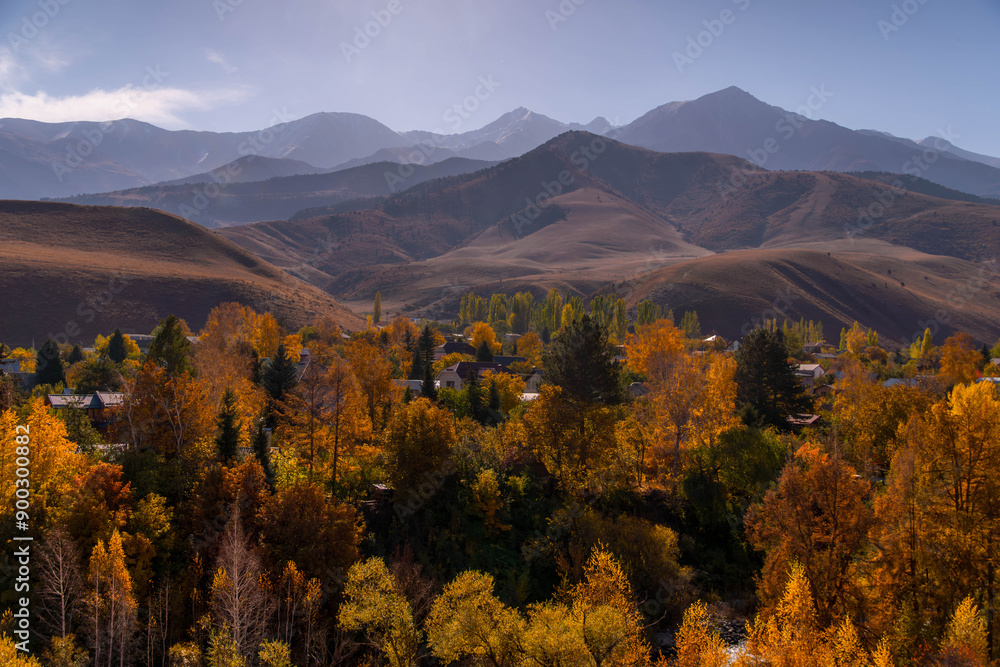 The scenic autumn landscape in Ala-Archa Nature Park, Kyrgyzstan, with ...