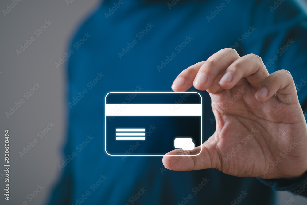 Man holding a blank credit card in a transparent floating UI interface ...
