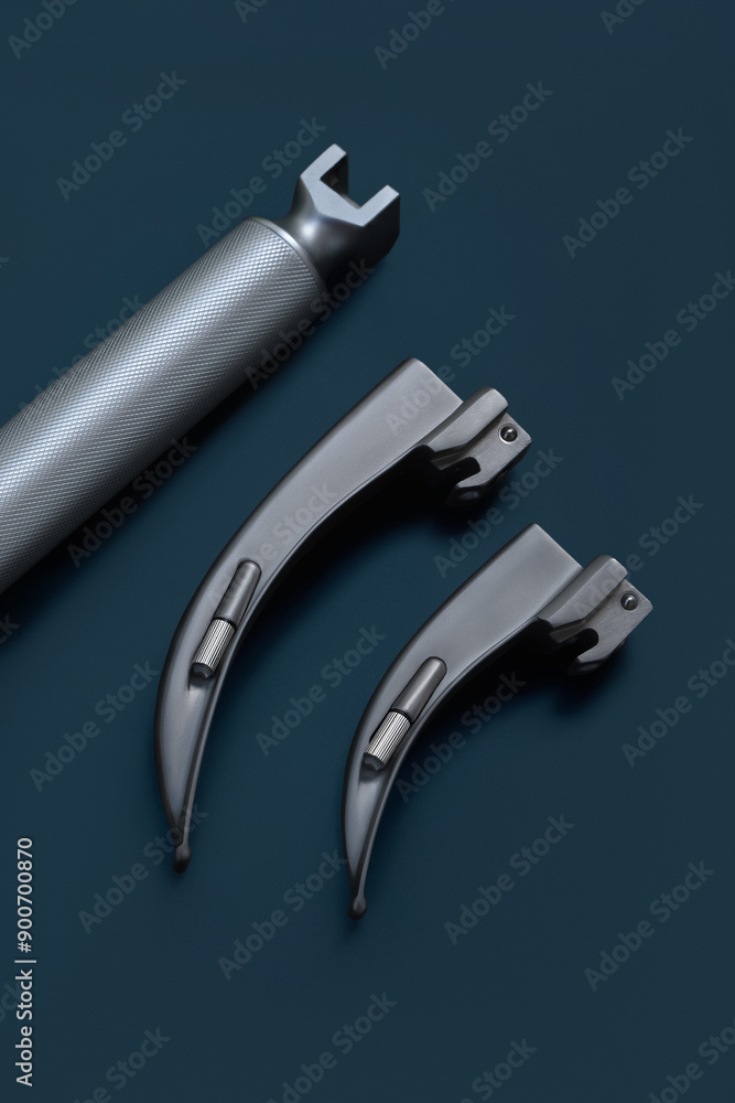 medical instruments on a dark background. tracheal intubation kit ...