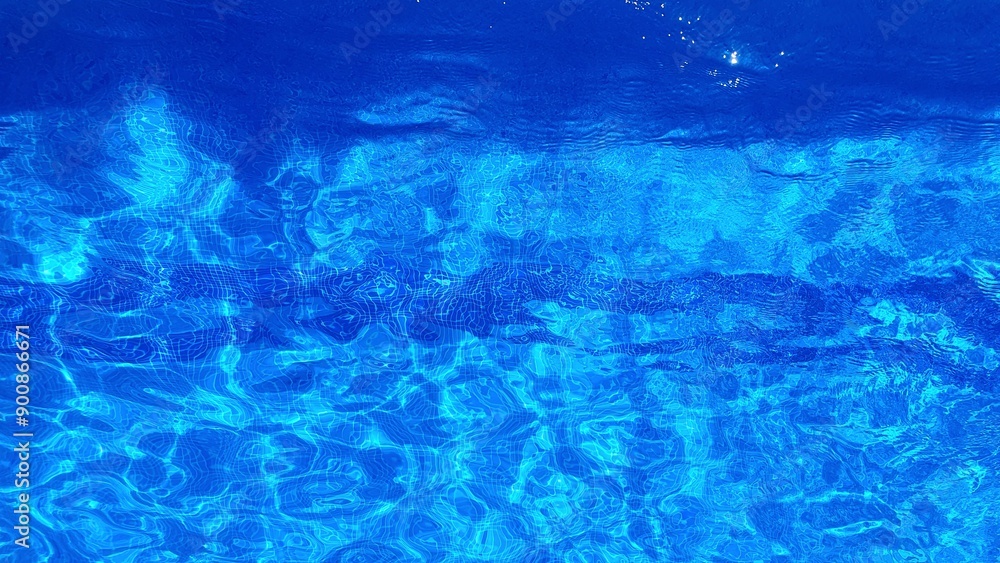 Clean water in the pool. Transparent blue water in a swimming pool ...