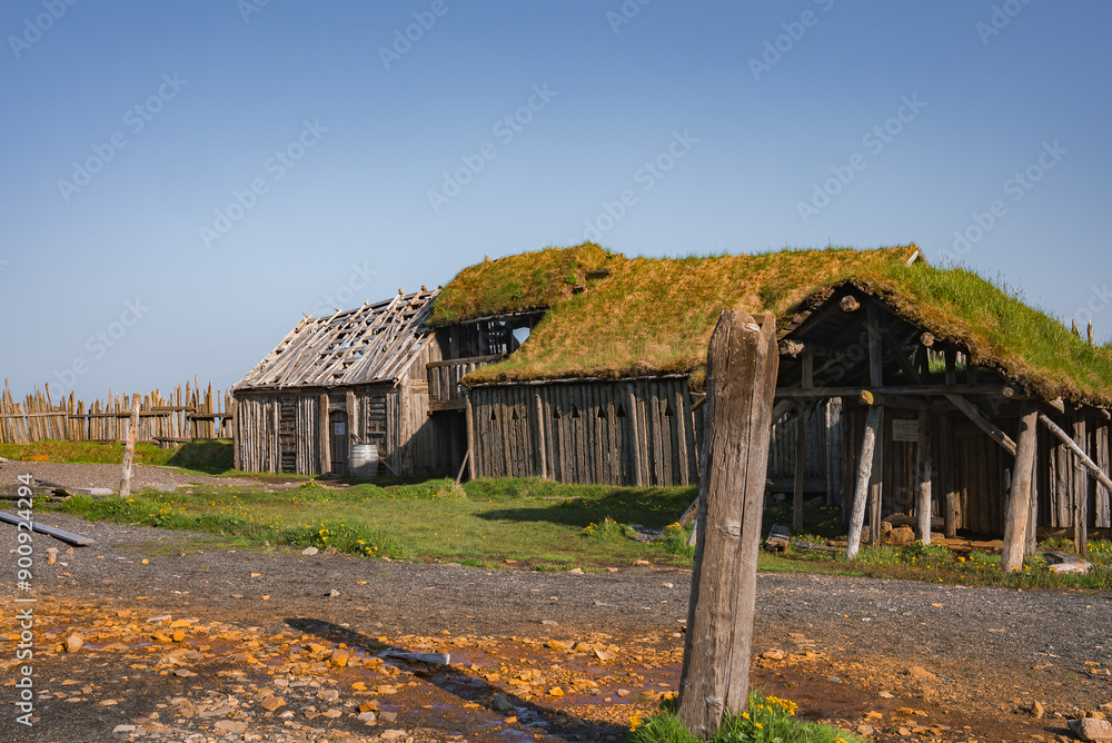 Weathered Icelandic turf house with wooden beams and partially ...
