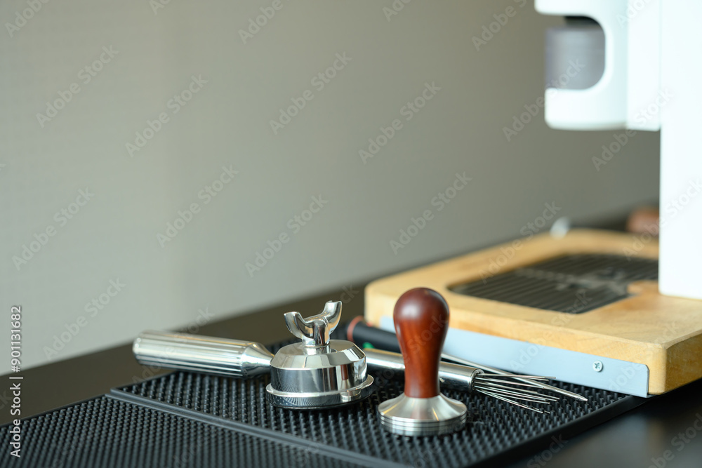 Coffee making tools. Espresso machine, portafilter and tamper arranged ...