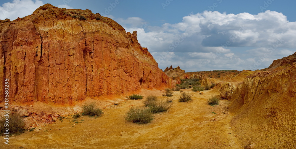 Northern Kyrgyzstan. The unusual texture of red-yellow clay rocks in ...
