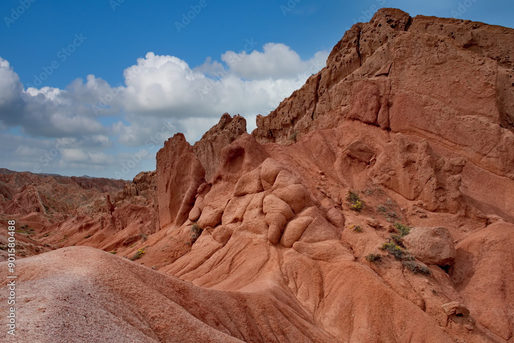 Northern Kyrgyzstan. The unusual texture of red-yellow clay rocks in ...