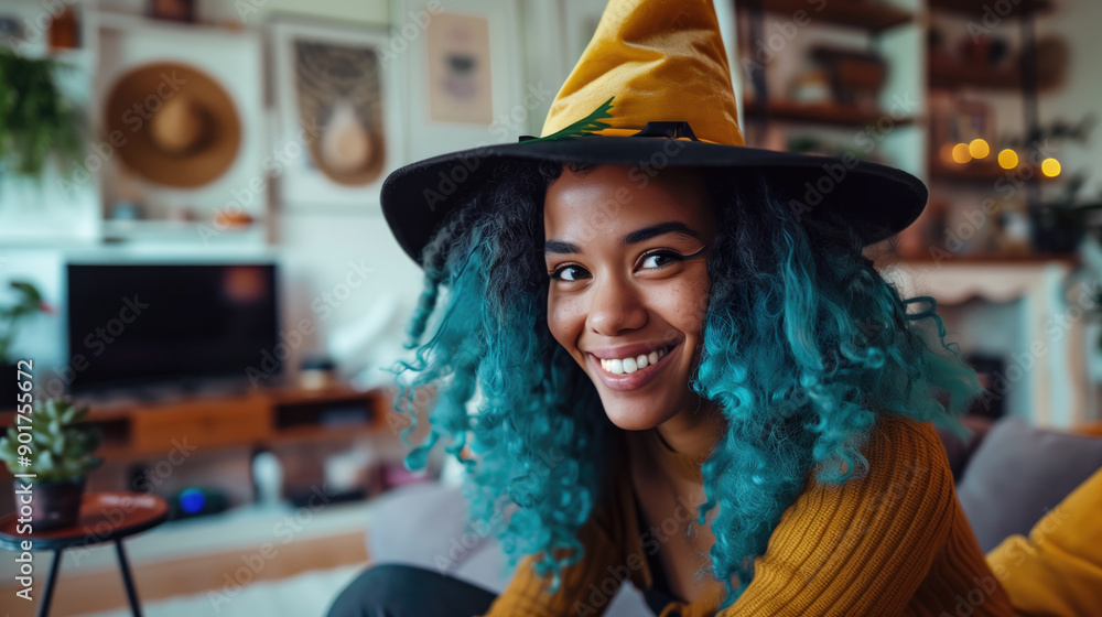 Woman influencer wearing witch costume and live streaming at home. She ...