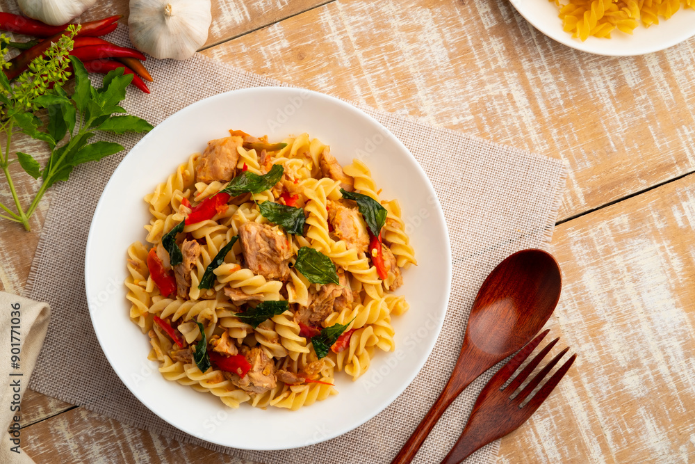 Stir fried trivelle pasta with Canned tuna fish and crispy basil leaves ...