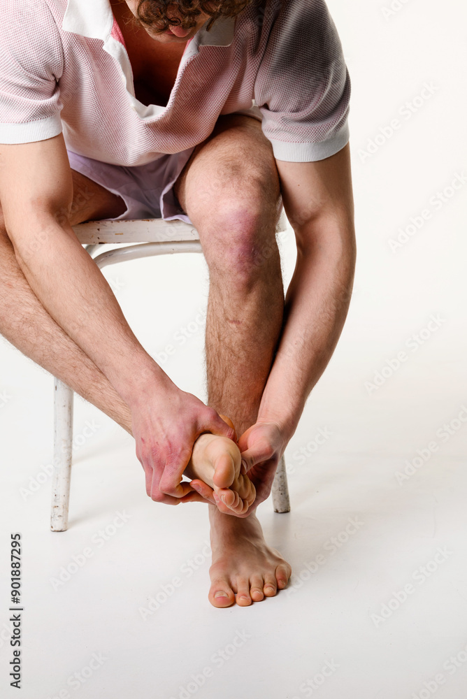 Podological problems. Experiencing sharp pain from flattened arches of ...