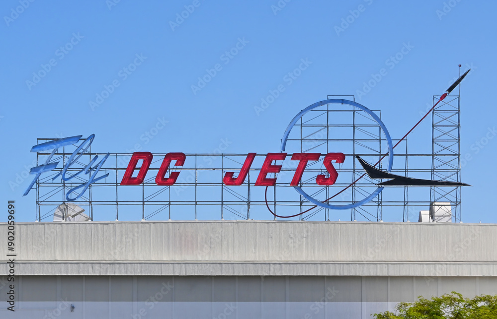 LONG BEACH, CALIFORNIA - 28 JULY 2024: Fly DC Jets sign atop the old ...