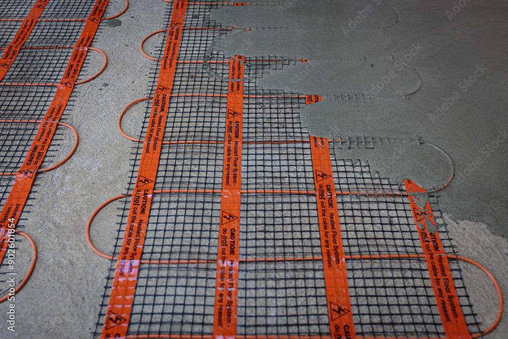 Underfloor heating installation. Electric cabling and conductive ...