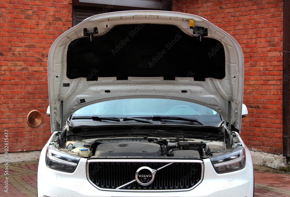 Vinnytsia, Ukraine; July 27, 2024. White Volvo XC40 open hood. Broken ...