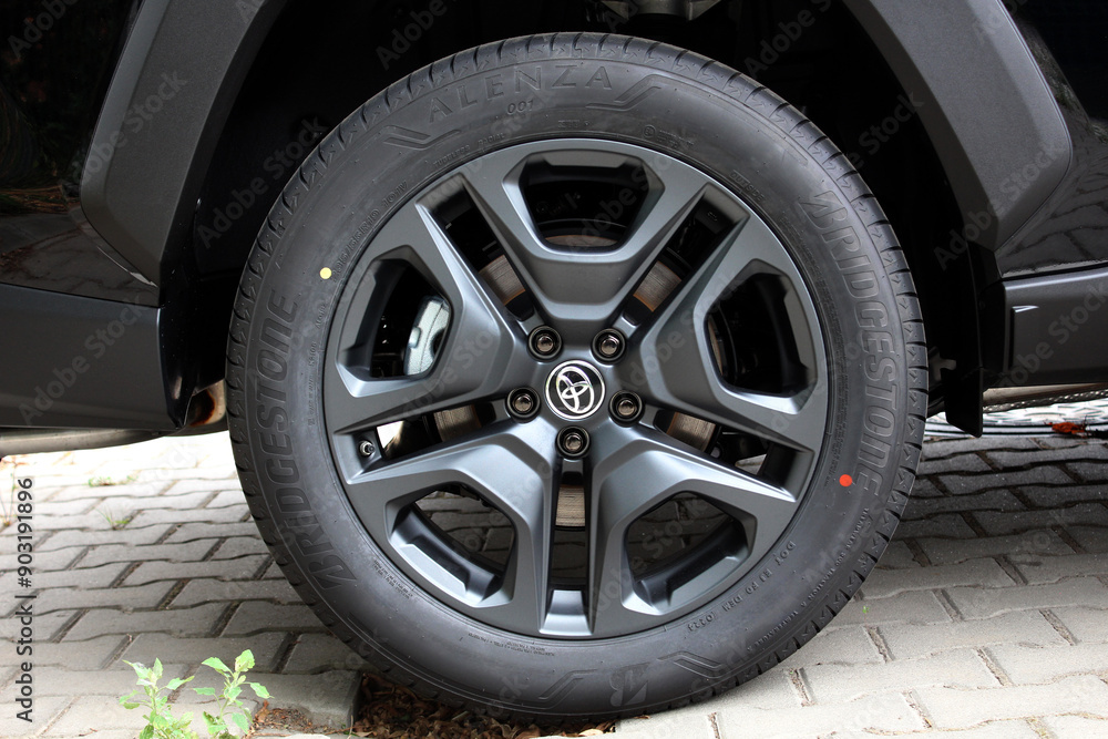 Vinnytsia, Ukraine; July 30, 2024. Toyota SUV wheel. Black Toyota RAV4 ...