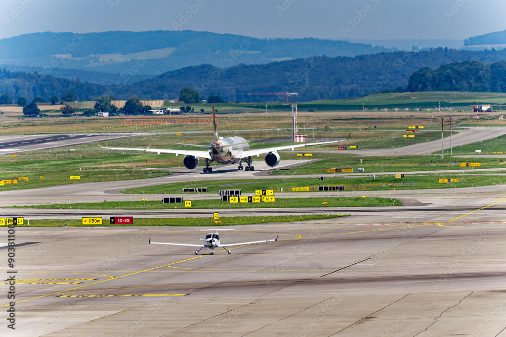 Etihad Airways Airbus A350-1000 A6-XWC airplane taxiing to runway at ...