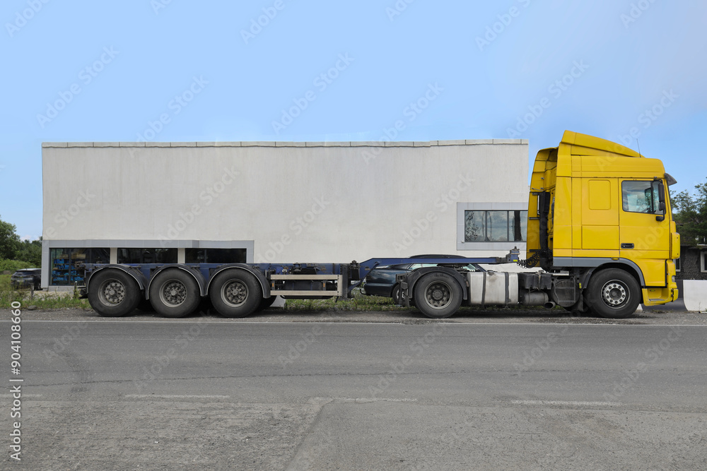 yellow Truck without Container - Cargo Logistics Freight parking along ...