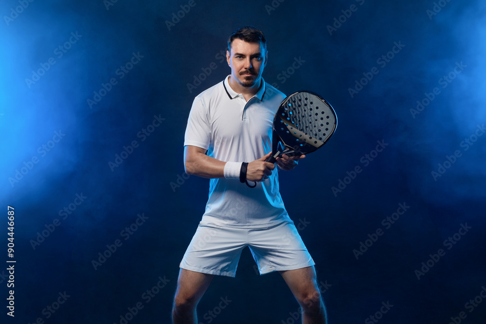 Padel tennis player with racket. Man athlete with paddle racket on ...