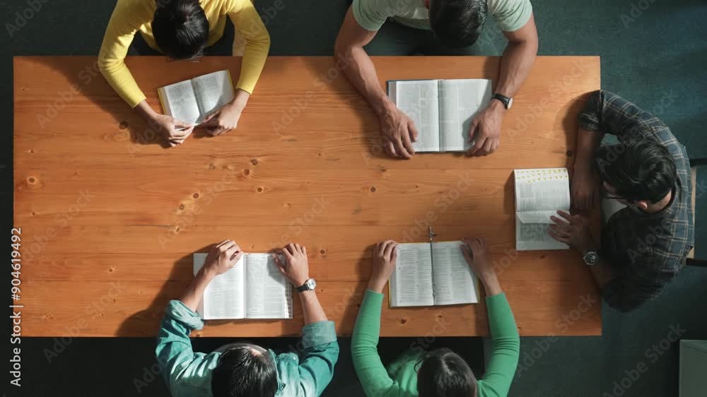 Top view of prayer hold each other support while prays to god at table ...