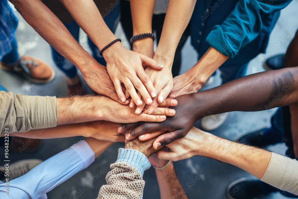 Diverse Hands Joined Together in Unity - Symbolizing Teamwork, Support, and Inclusivity in a ...