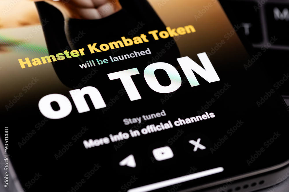 Hamster Kombat logo on a screen closeup smartphone, iPhone. Hamster ...