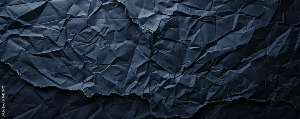 Dark navy blue background with a crumpled paper texture, adding depth ...