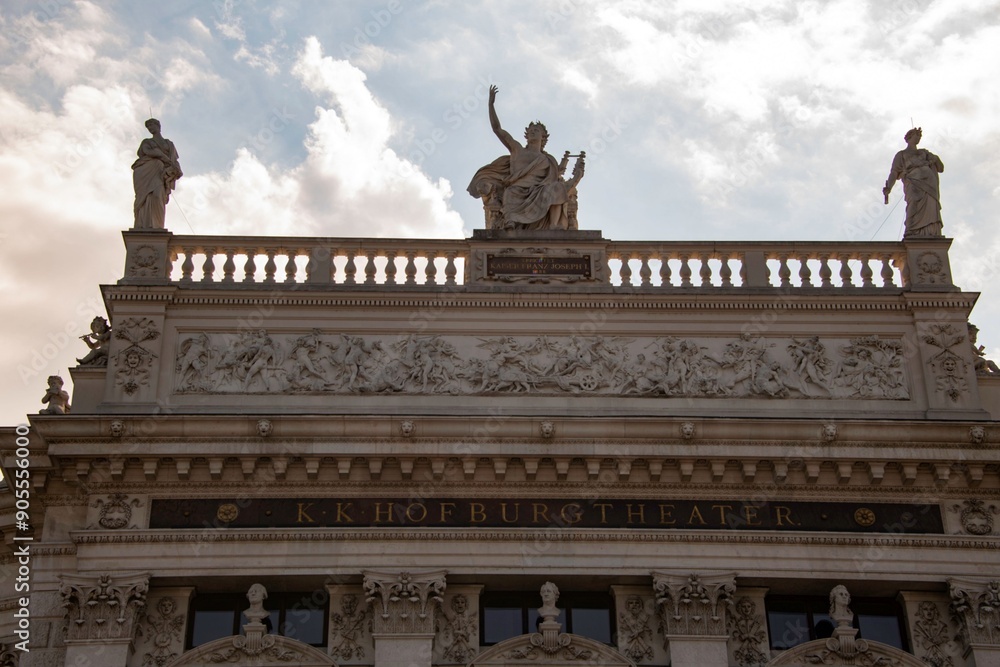 Vienna, Austria - 07 17 2024: The front facade and rooftop of the Burg ...