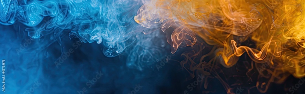 Abstract Flowing Yellow and Blue Smoke Against a Solid Black Background ...