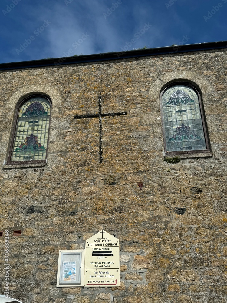 Fore Street Methodist Church with stained glass windows under a blue ...