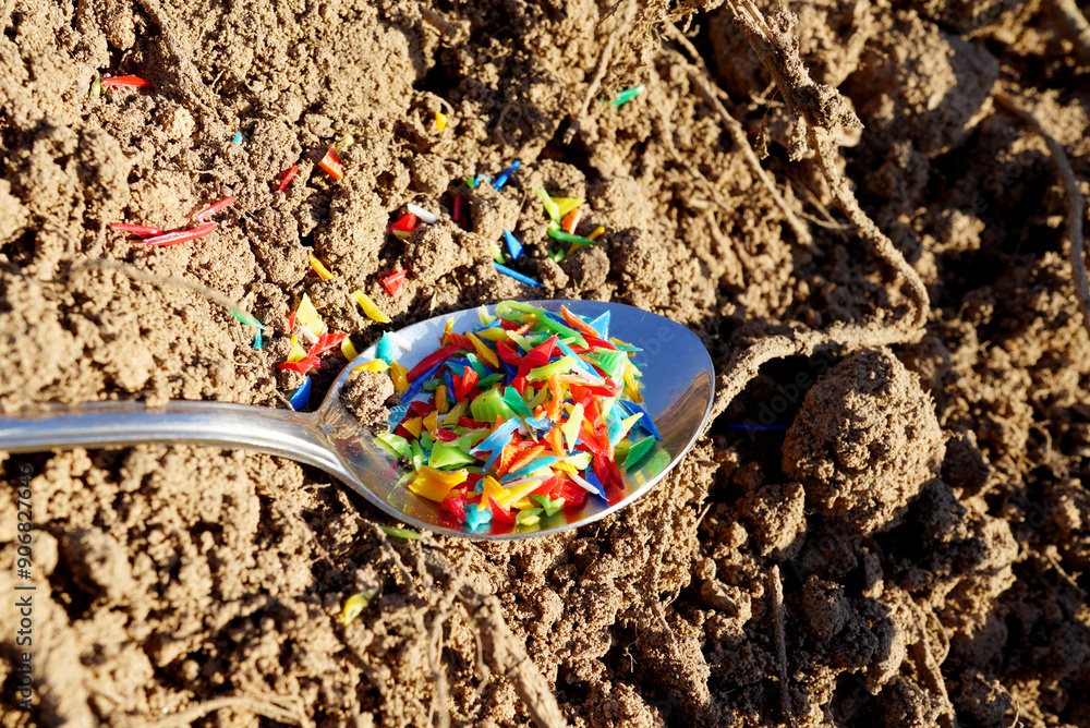 Microplastic pollution. Microplastic in a spoon against the background ...