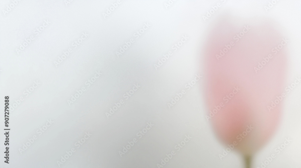 Behind the glass, the subtle suggestion of a tulip is softly ...