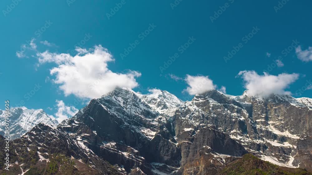 4K Time-lapse shot of clouds above the snow covered Himalayan mountain ...